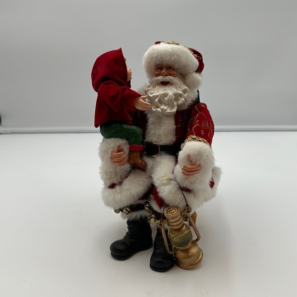 Fabric Mache Beautiful Santa Claus Sitting on Bench Holding Ai Child